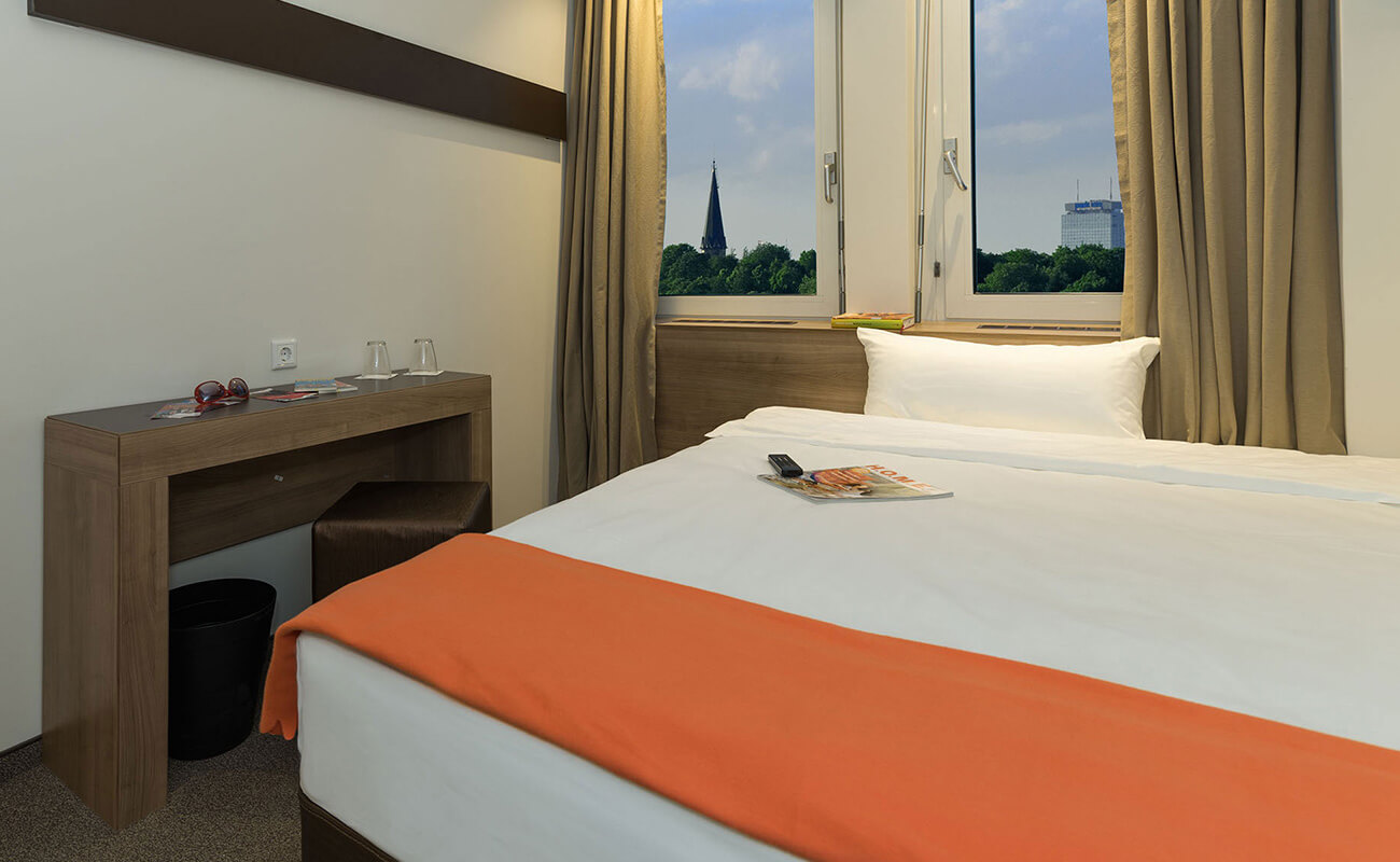 Einzelzimmer Motel Plus Motel Plus Berlin GmbH & Co KG